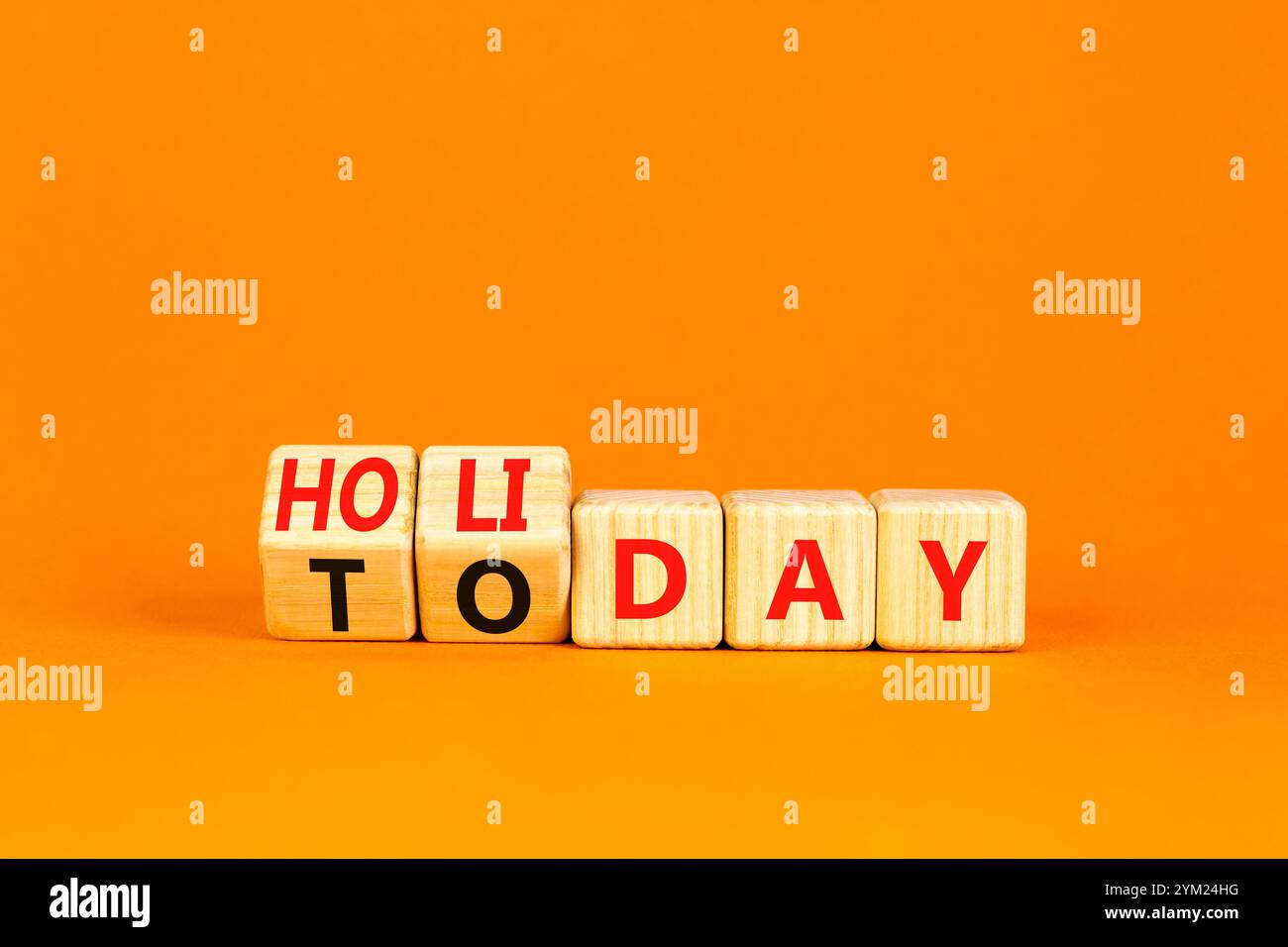 Today is holiday symbol. Concept word Today and Holiday on wooden cubes ...