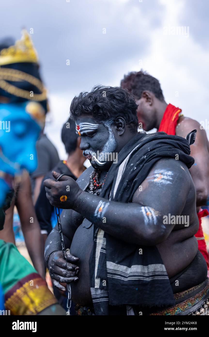 Kulasai Dasara, Portrait of indian hindu devotee with painted face and ...