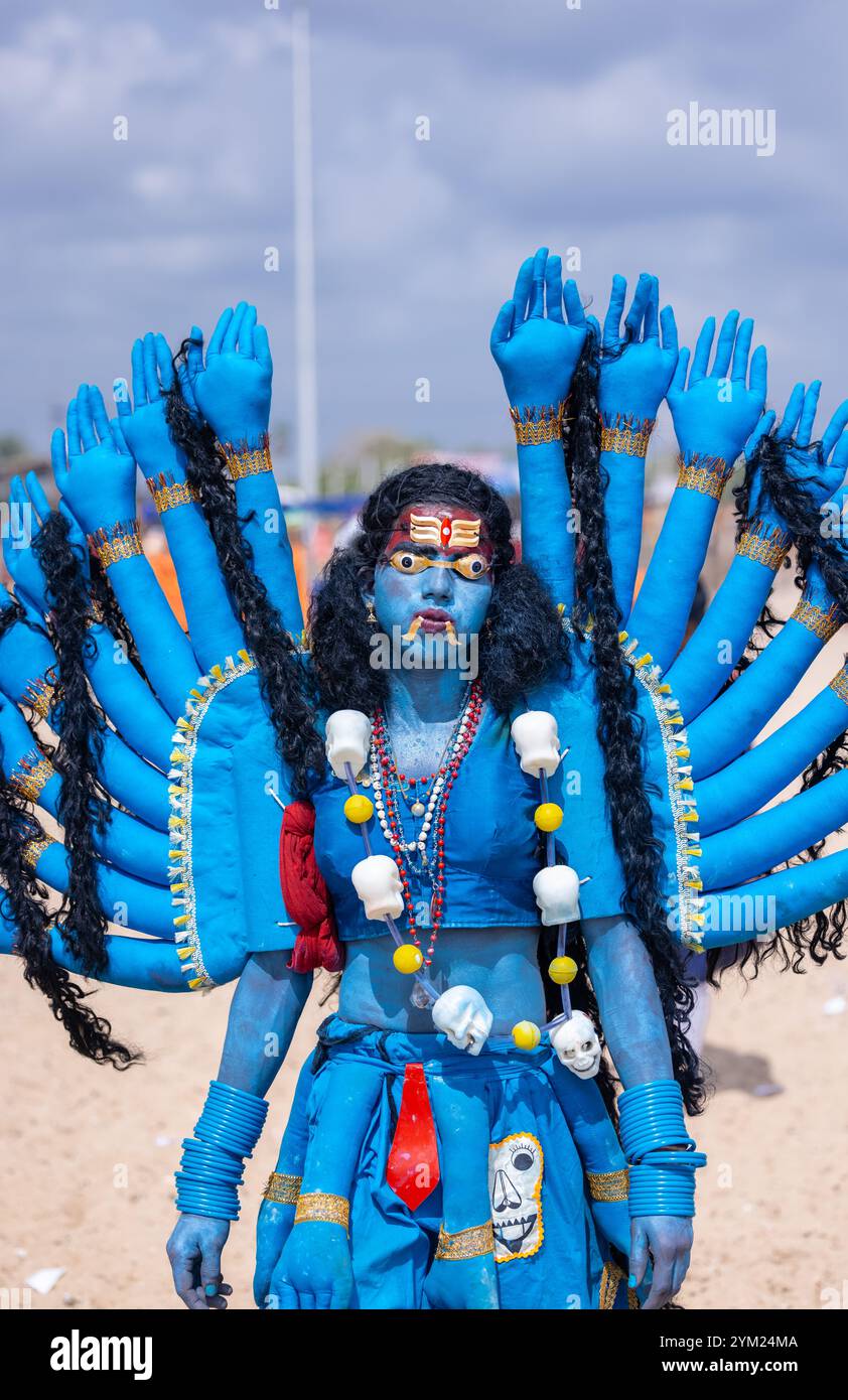 Kulasai Dasara, Portrait of indian hindu devotee with painted face and ...