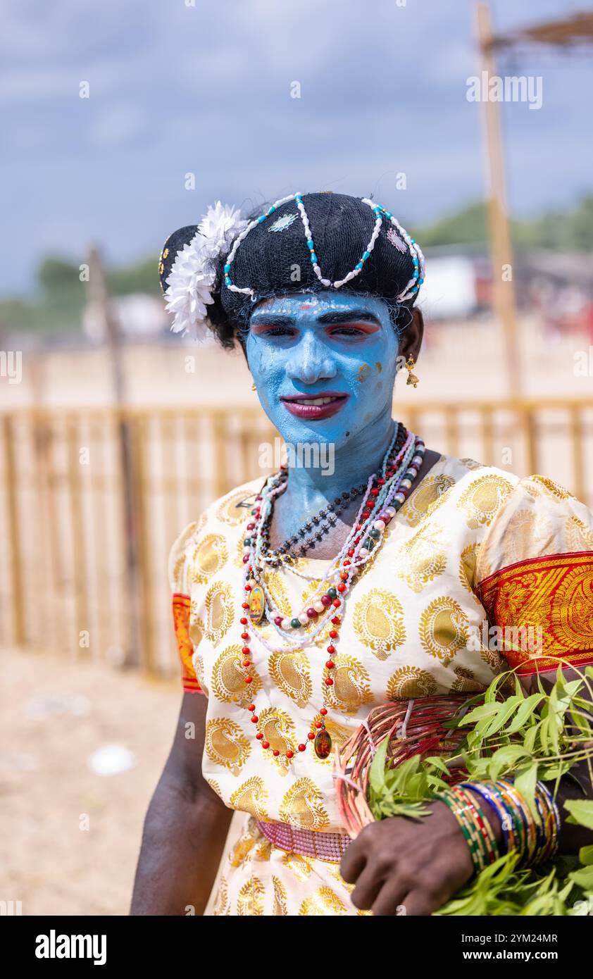 Kulasai Dasara, Portrait of indian hindu devotee with painted face and ...