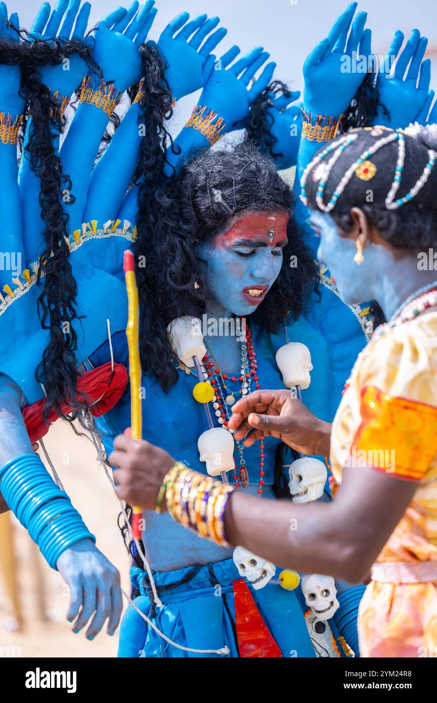 Kulasai Dasara, Portrait of indian hindu devotee with painted face and ...