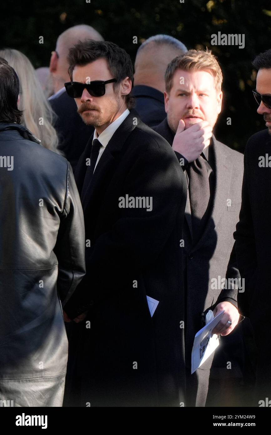 Harry Styles (left) and James Corden (third right) after the funeral ...