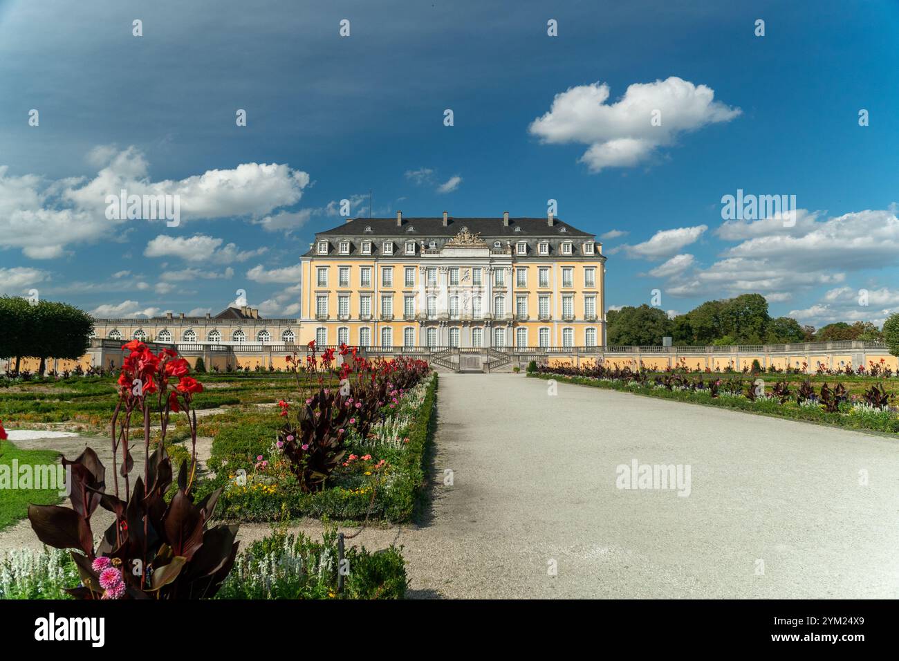 Augustusburg Palace and Falkenlust Hunting Lodge. A grand yellow ...