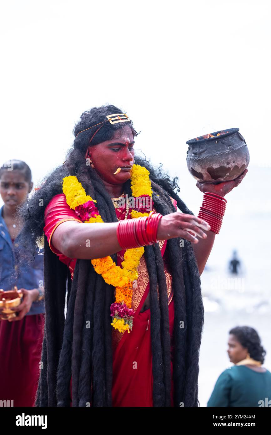 Kulasai Dasara, Portrait of indian hindu devotee with painted face and ...