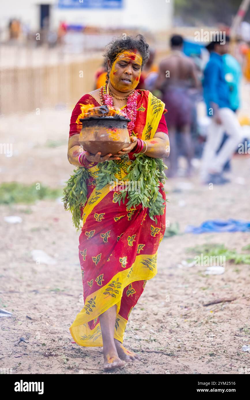 Kulasai Dasara, Portrait of indian hindu devotee with painted face and ...