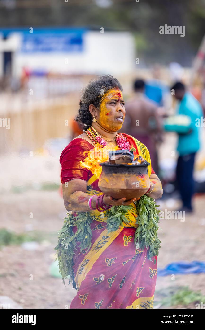 Kulasai Dasara, Portrait of indian hindu devotee with painted face and ...