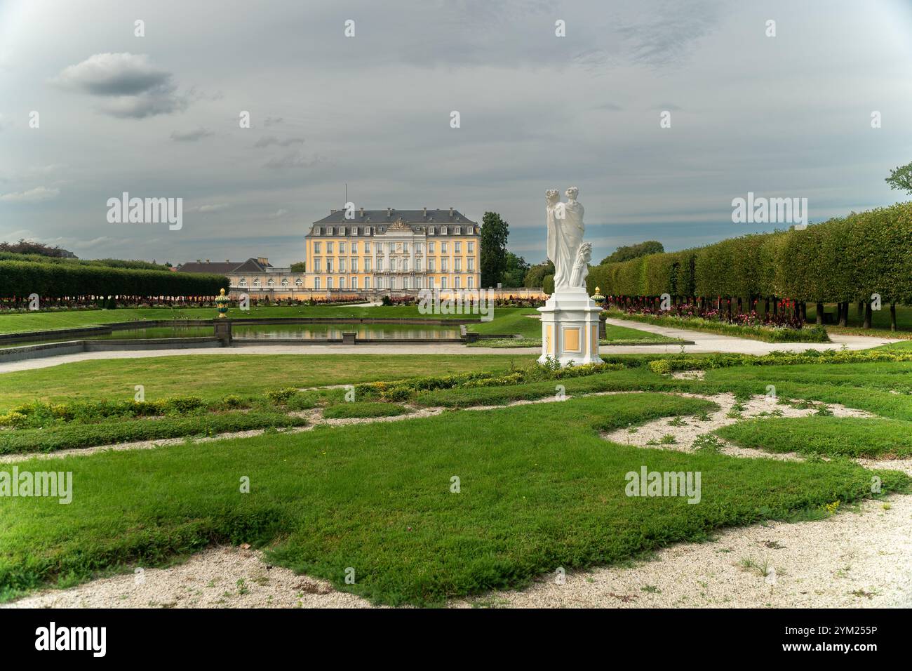 Augustusburg Palace and Falkenlust Hunting Lodge. A grand yellow ...