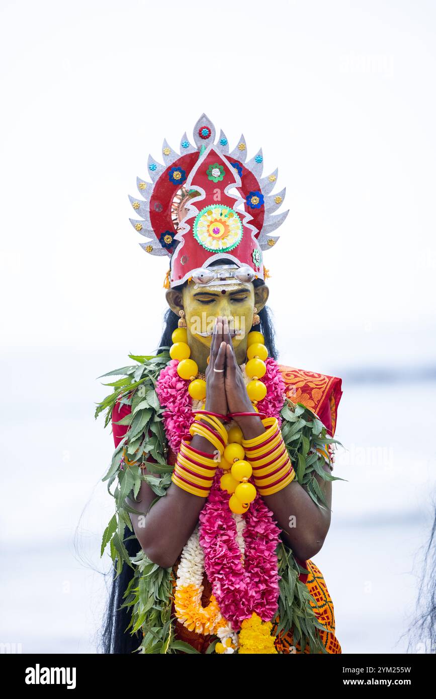 Kulasai Dasara, Portrait of indian hindu devotee with painted face and ...
