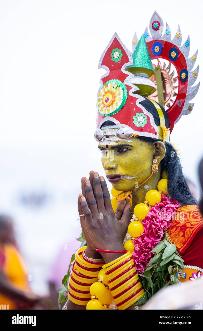 Kulasai Dasara, Portrait of indian hindu devotee with painted face and ...