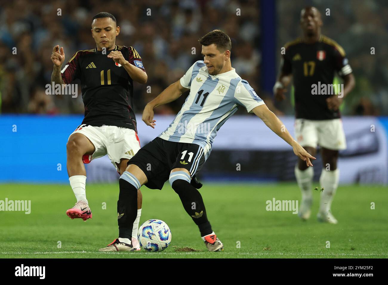 Argentina's midfielder Giovani Lo Celso (C) drives the ball next Peru's ...