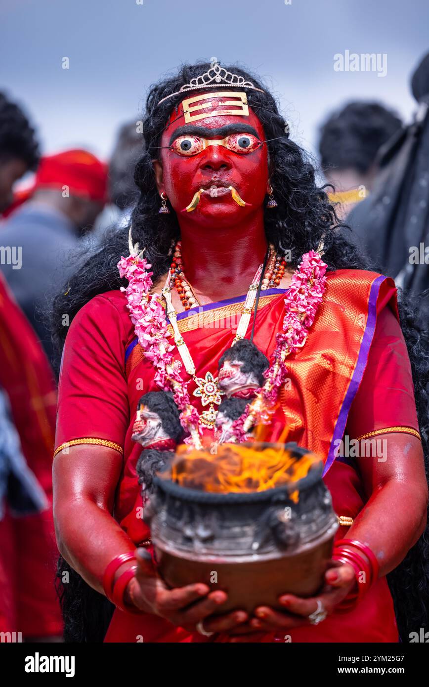 Kulasai Dasara, Portrait of indian hindu devotee with painted face and ...