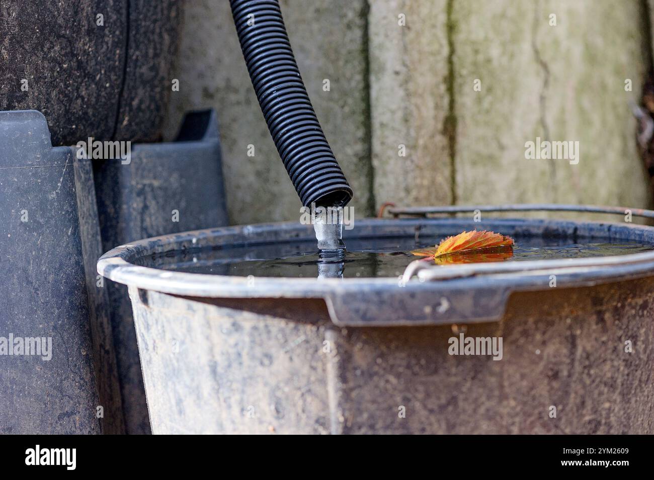 Ice forms at the end of a pipe blocking the flow of water into an ...