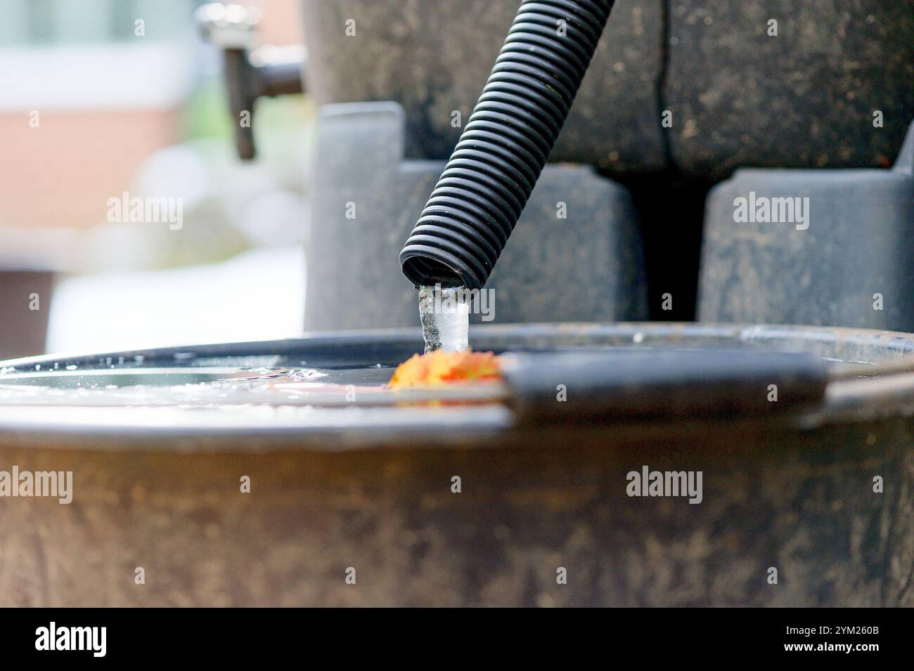 Ice forms at the end of a pipe blocking the flow of water into an ...