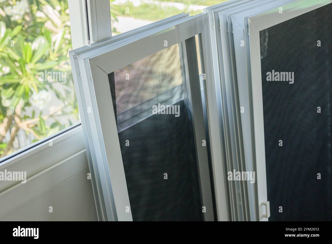 Mosquito net window screens protection against insect Stock Photo - Alamy