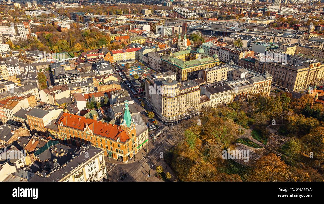 Ancient castle and green areas, colorful roofs and various buildings ...