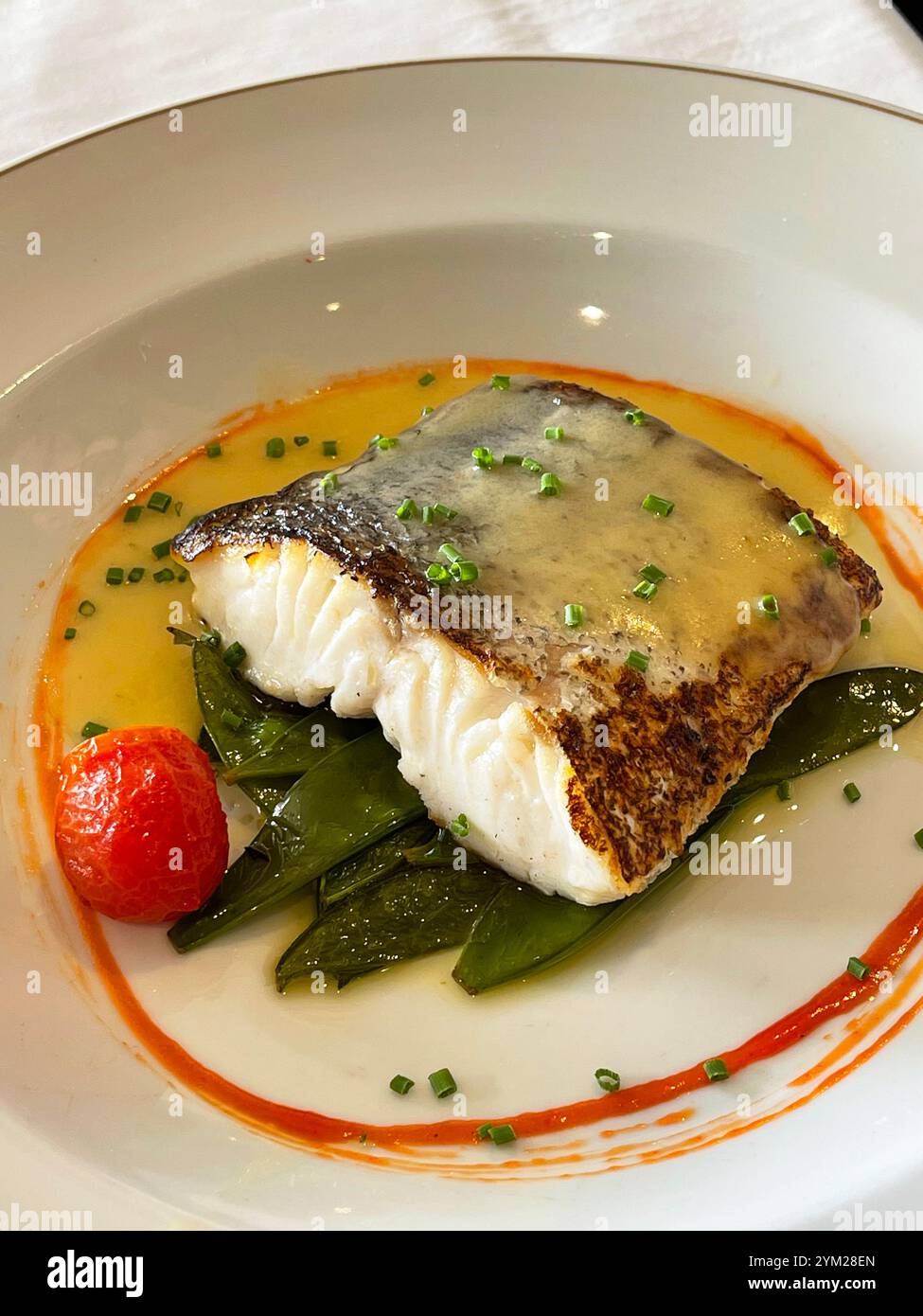 Cod loin with vegetables. Spain Stock Photo - Alamy