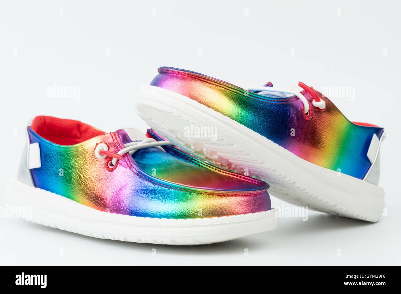 Vibrant rainbow shoes showcase reflective surface and modern design ...