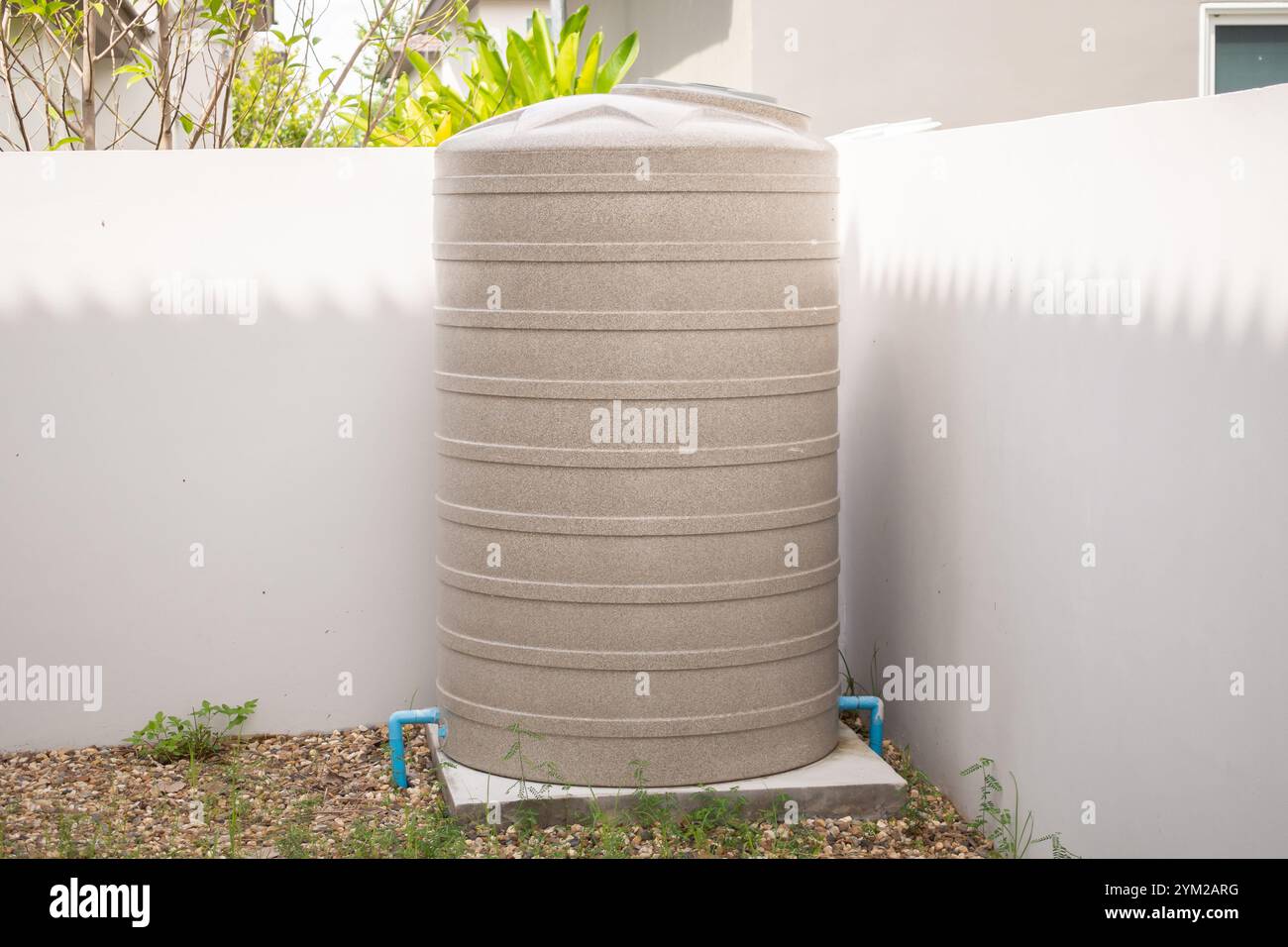 Water storage tank outside the house Stock Photo - Alamy