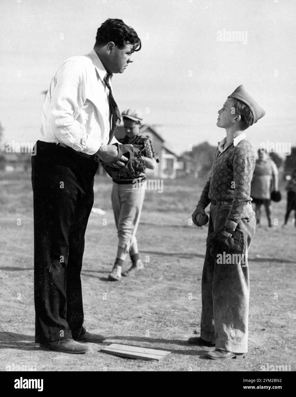 Babe Ruth teaching a kid about baseball - from the production of ...