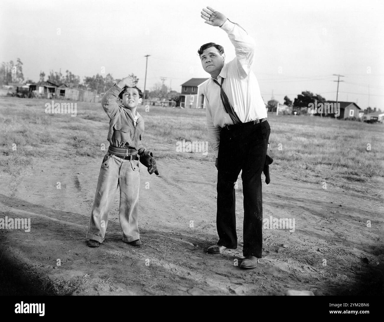 Babe Ruth and a kid playing baseball - from the production of Unversals ...