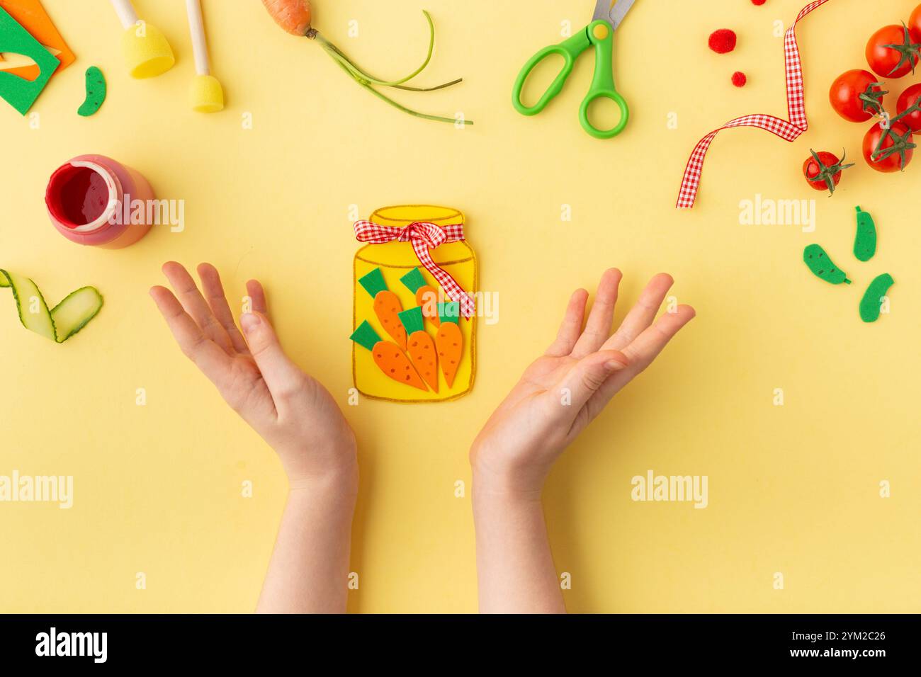 Paper jar with vegetables (tomato, carrot and cucumber) on yellow idea ...