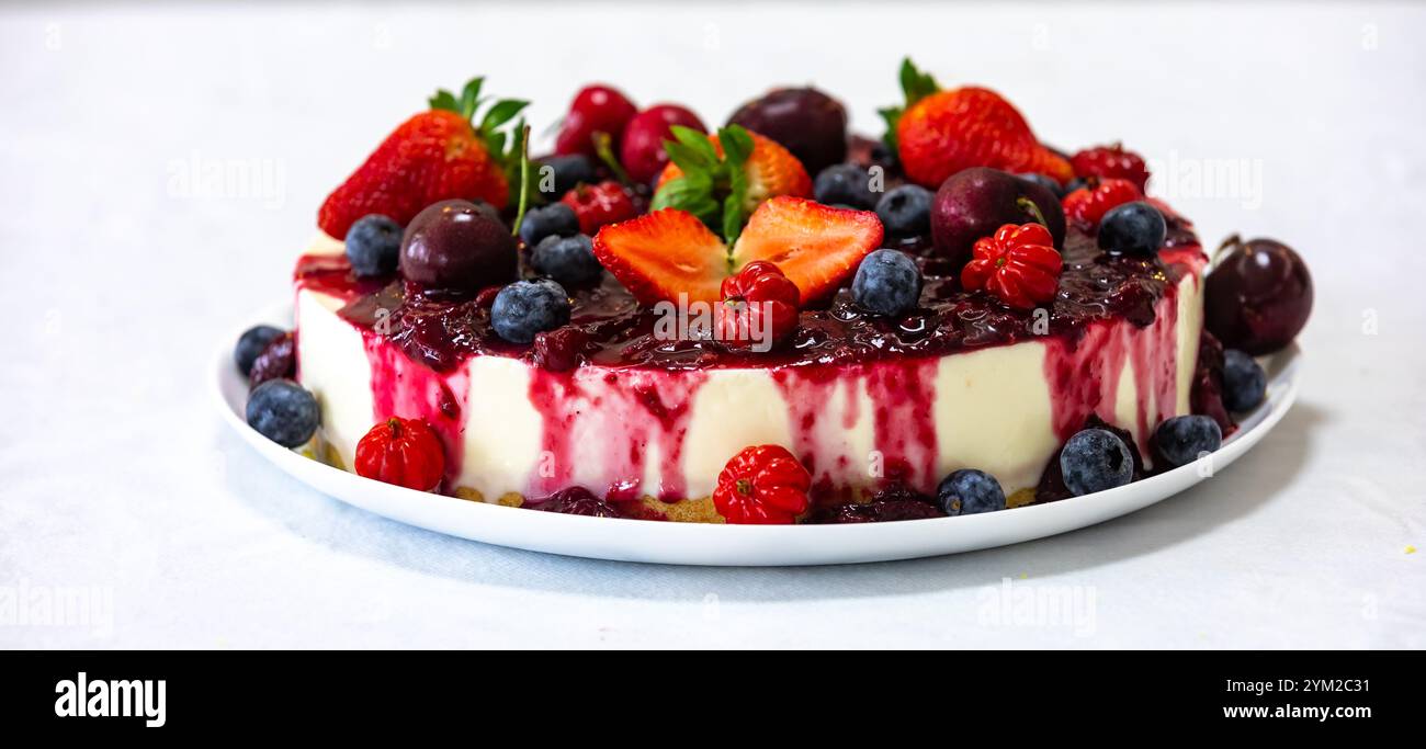 Traditional Christmas red fruit cheesecake with creative and luxurious ...