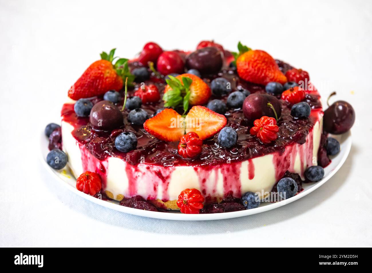 Traditional Christmas red fruit cheesecake with creative and luxurious ...