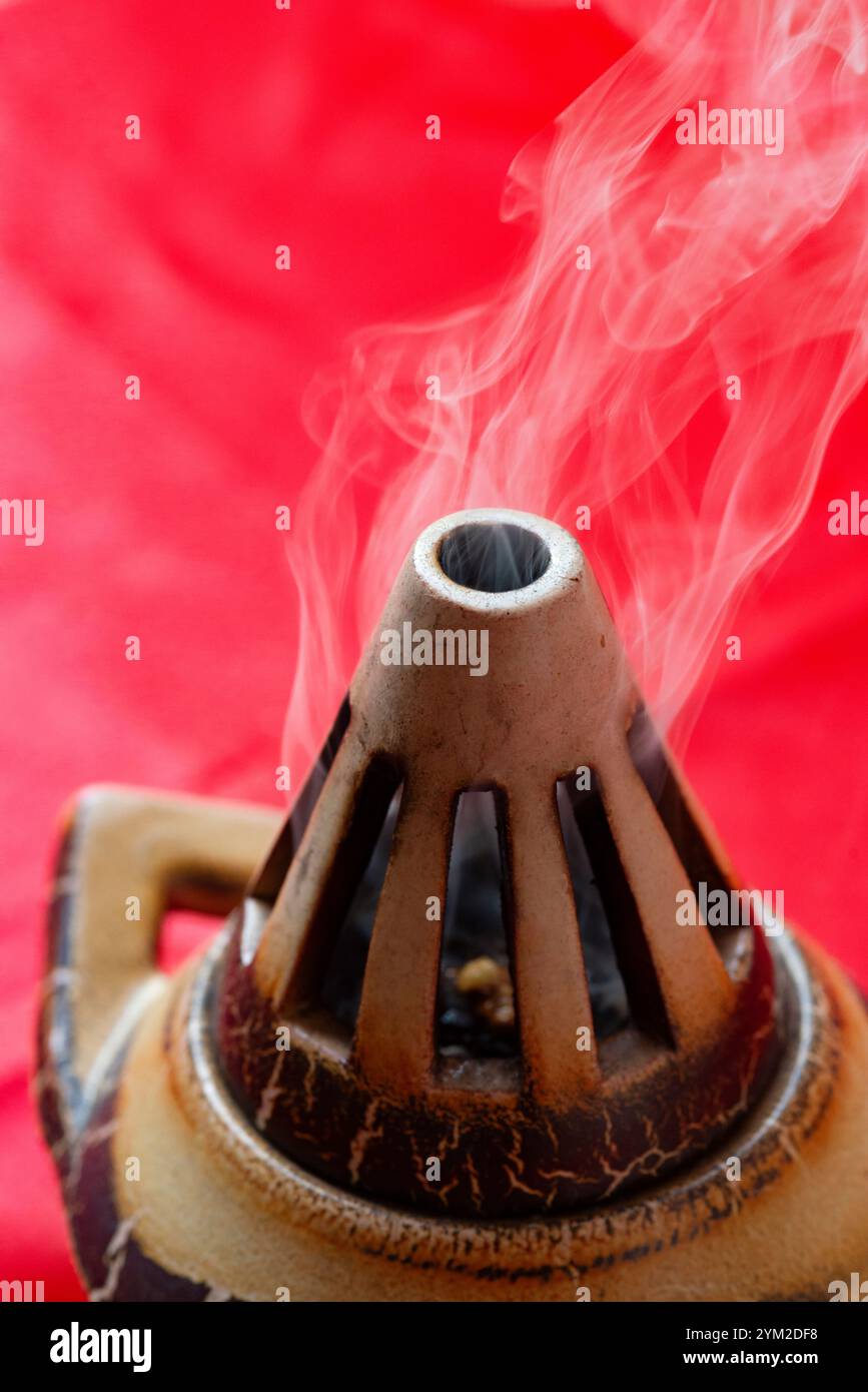 Smell smelling incense hi-res stock photography and images - Alamy