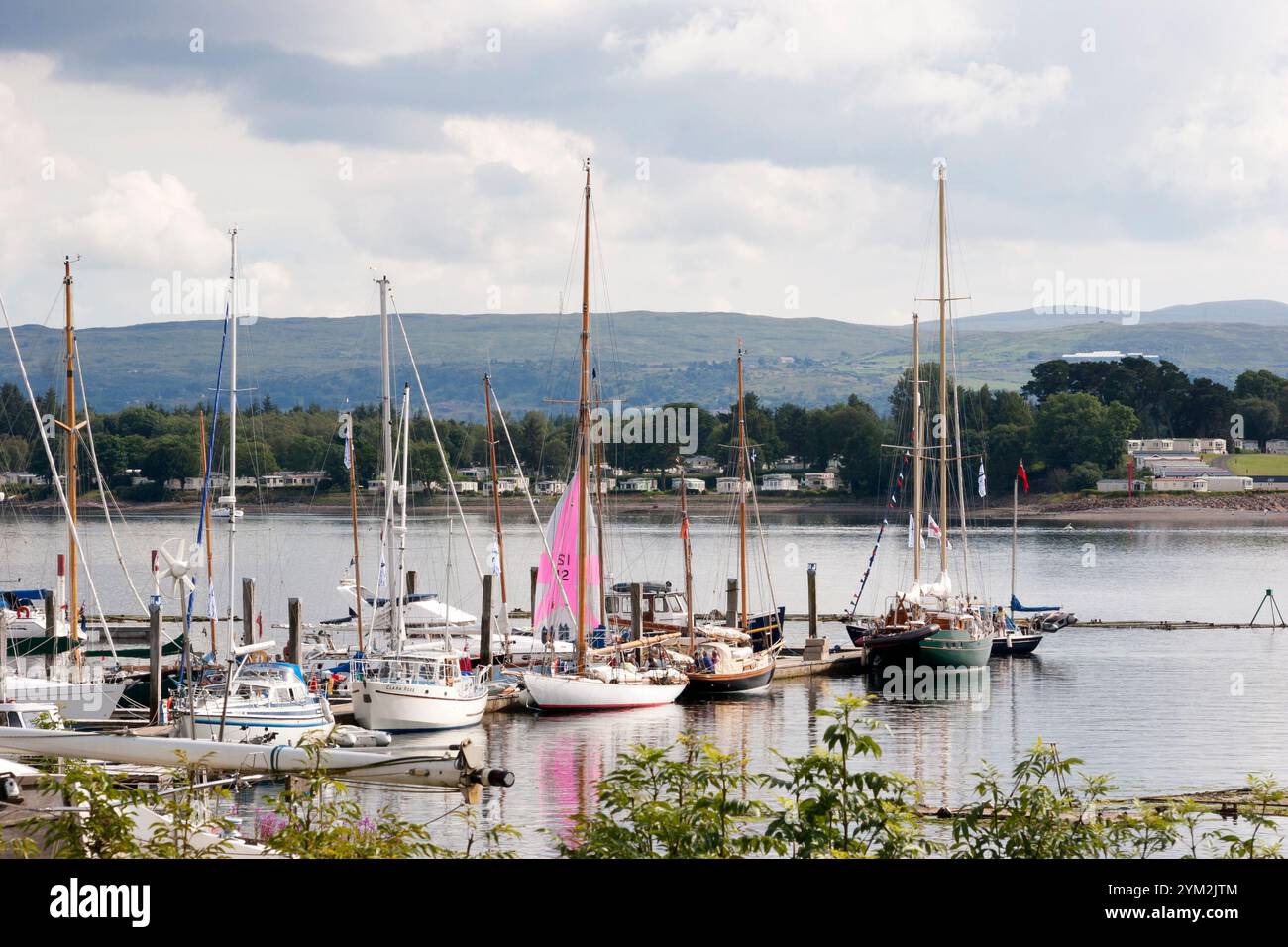 Yachts moored at Rhu Marina with Rosneath Caravan Park in the ...