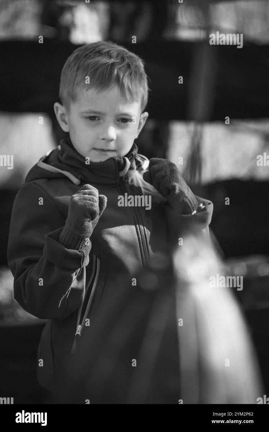 Portrait of a boy practicing boxing outdoor Stock Photo - Alamy