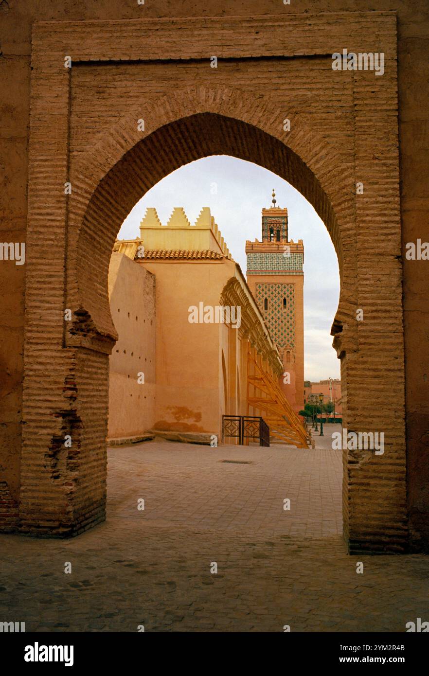Through an archway the minaret of the Moulay Al Yazid Kasbah Mosque in ...