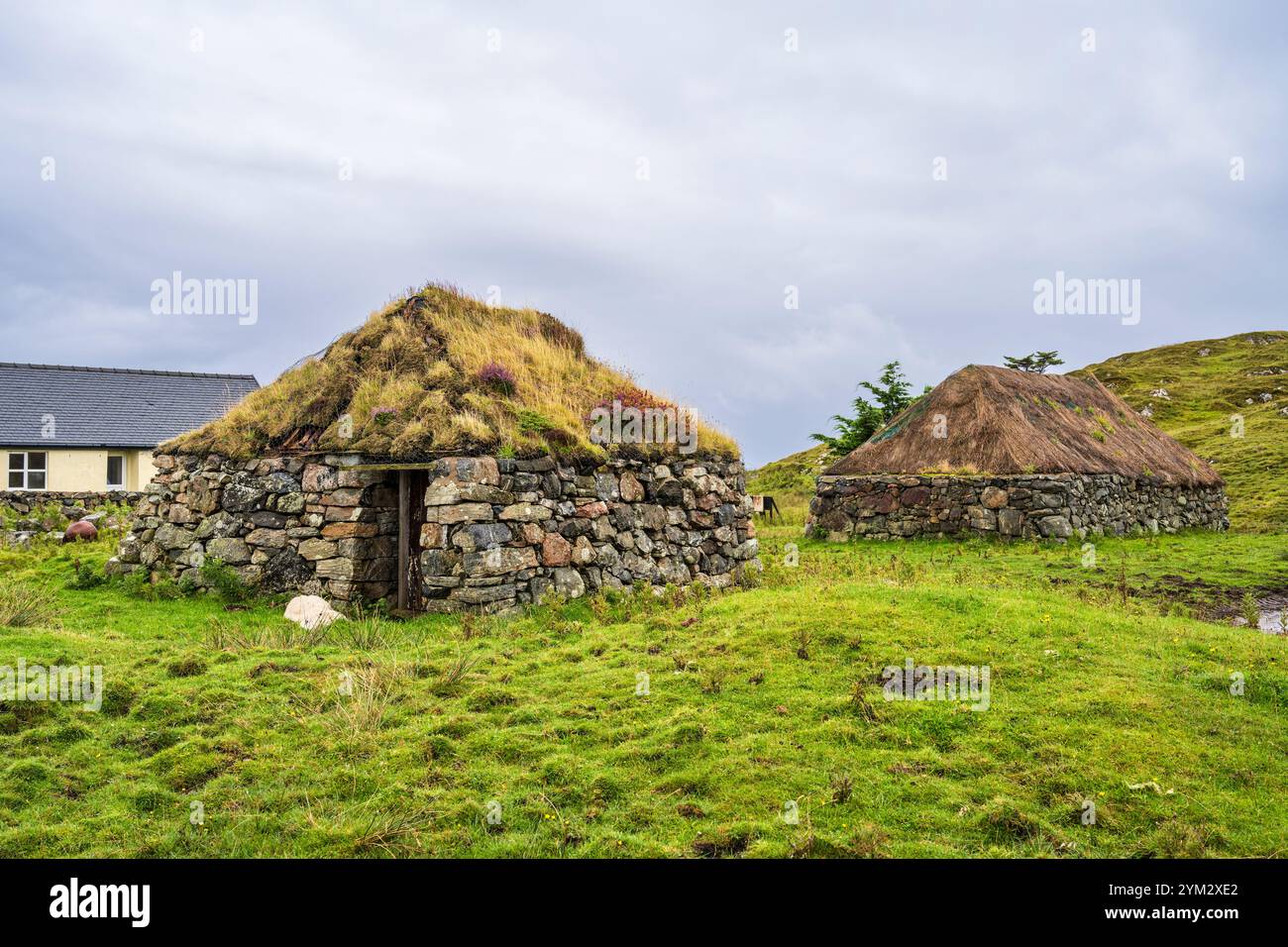Turf-roofed buildings in the village of Sorisdale on Isle of Coll ...
