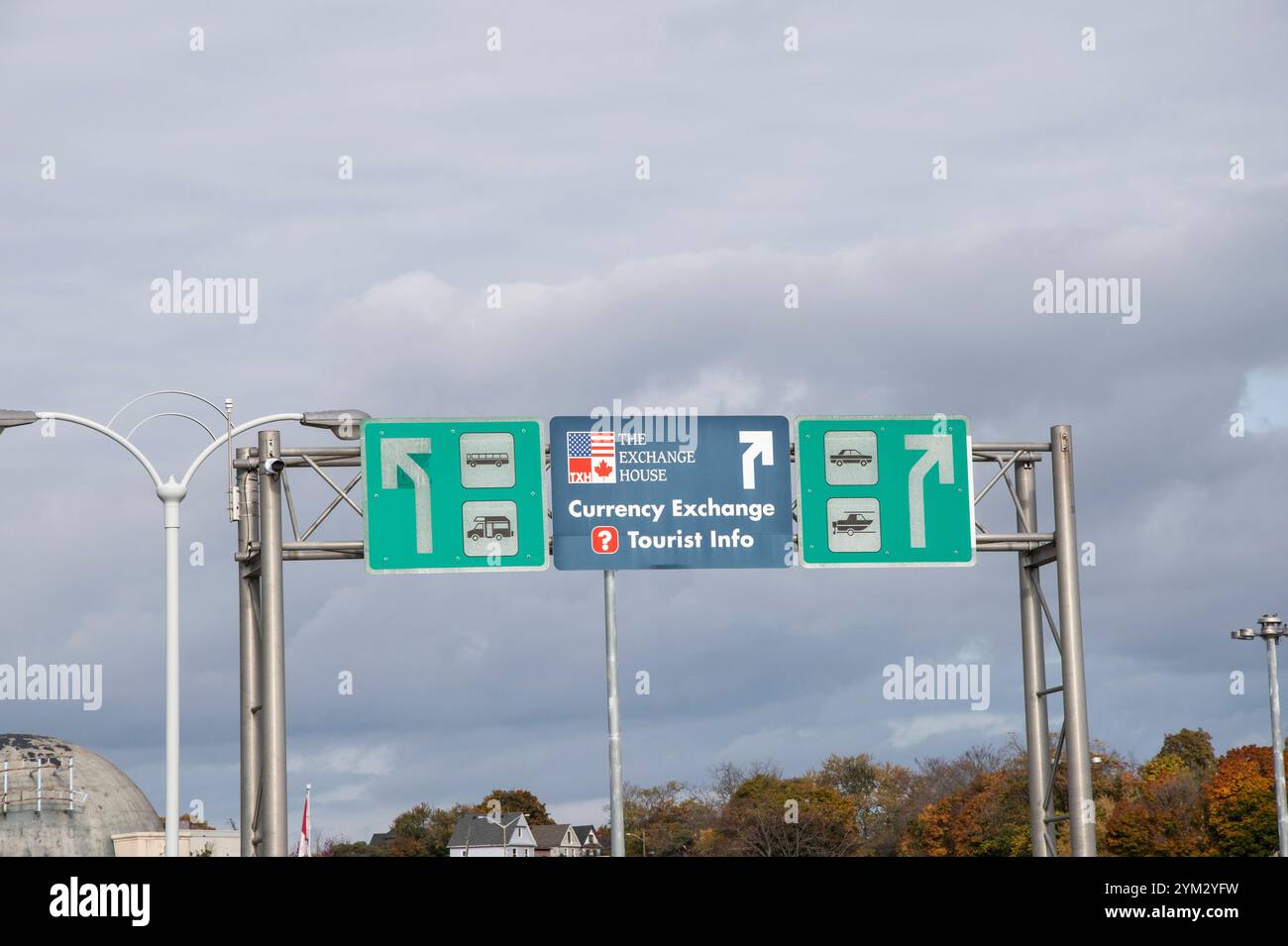 Customs currency exchange signs on the Rainbow Bridge in Niagara Falls ...