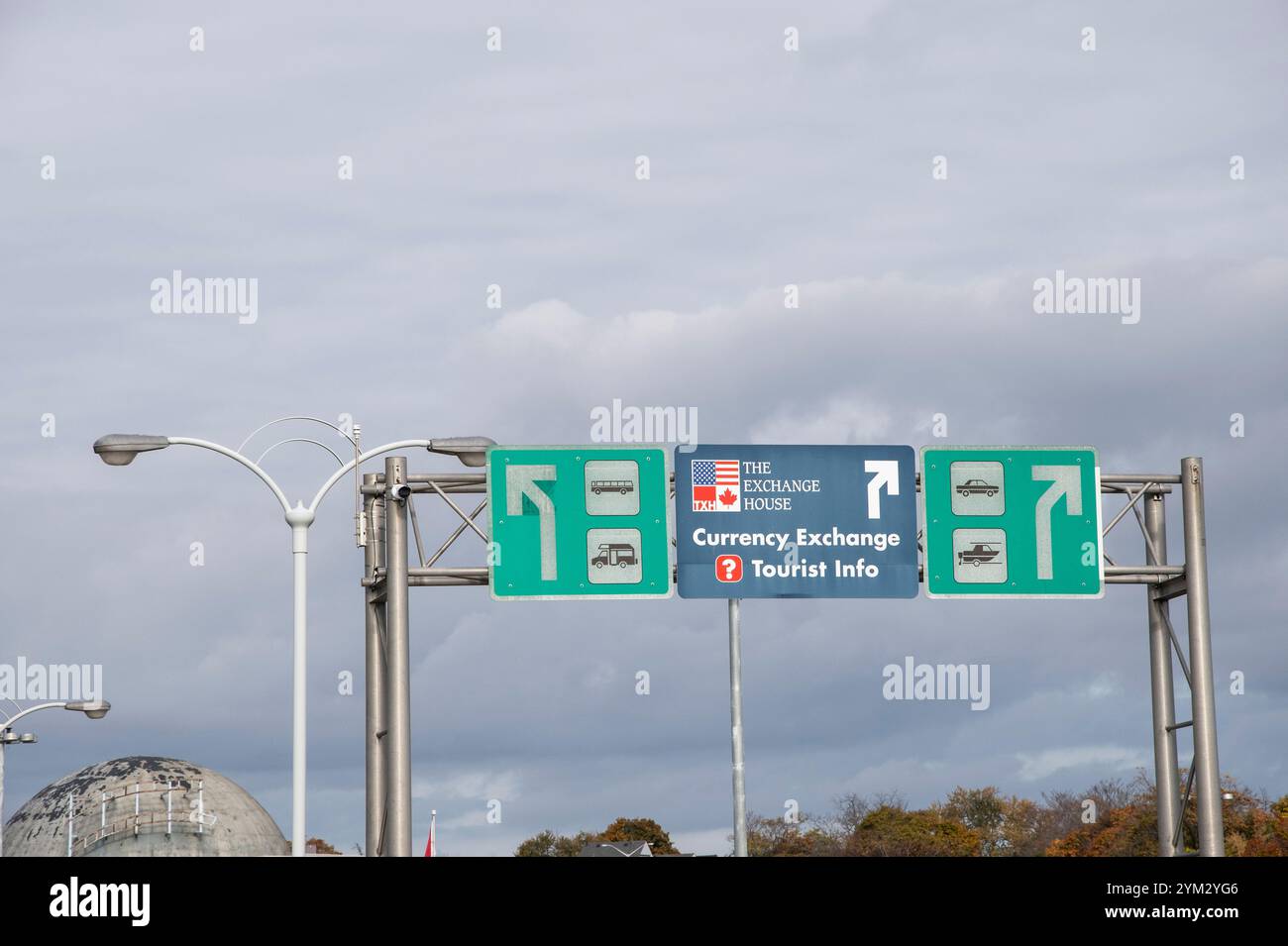 Customs currency exchange signs on the Rainbow Bridge in Niagara Falls ...