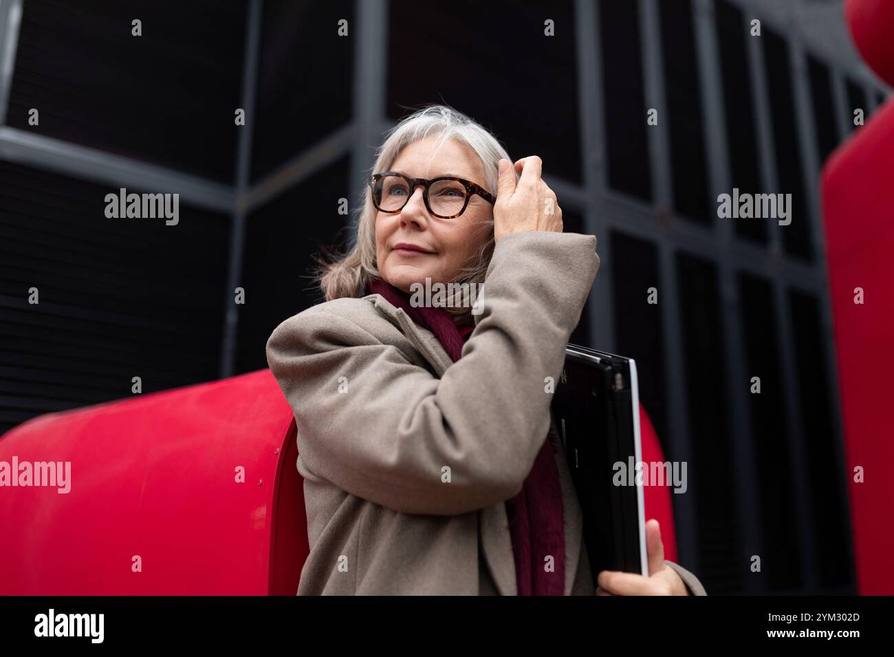 Tucked under his arm hi-res stock photography and images - Alamy
