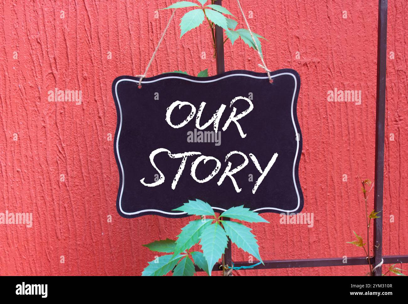 Our story symbol. Concept words Our story on black chalk blackboard ...