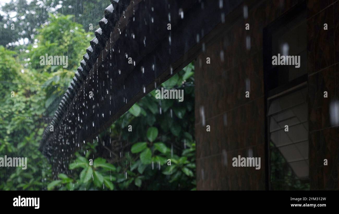 Rainwater flowing down from roof hi-res stock photography and images ...