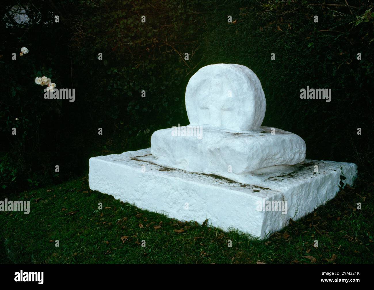 A relief Latin cross on the E face of Whitecross wayside cross, beside ...