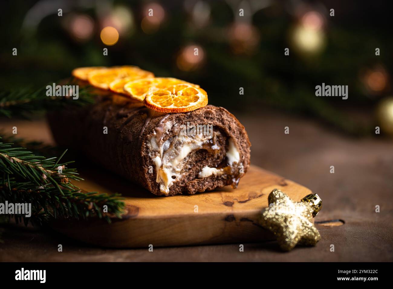 Christmas chocolate roll cake with cream Stock Photo - Alamy