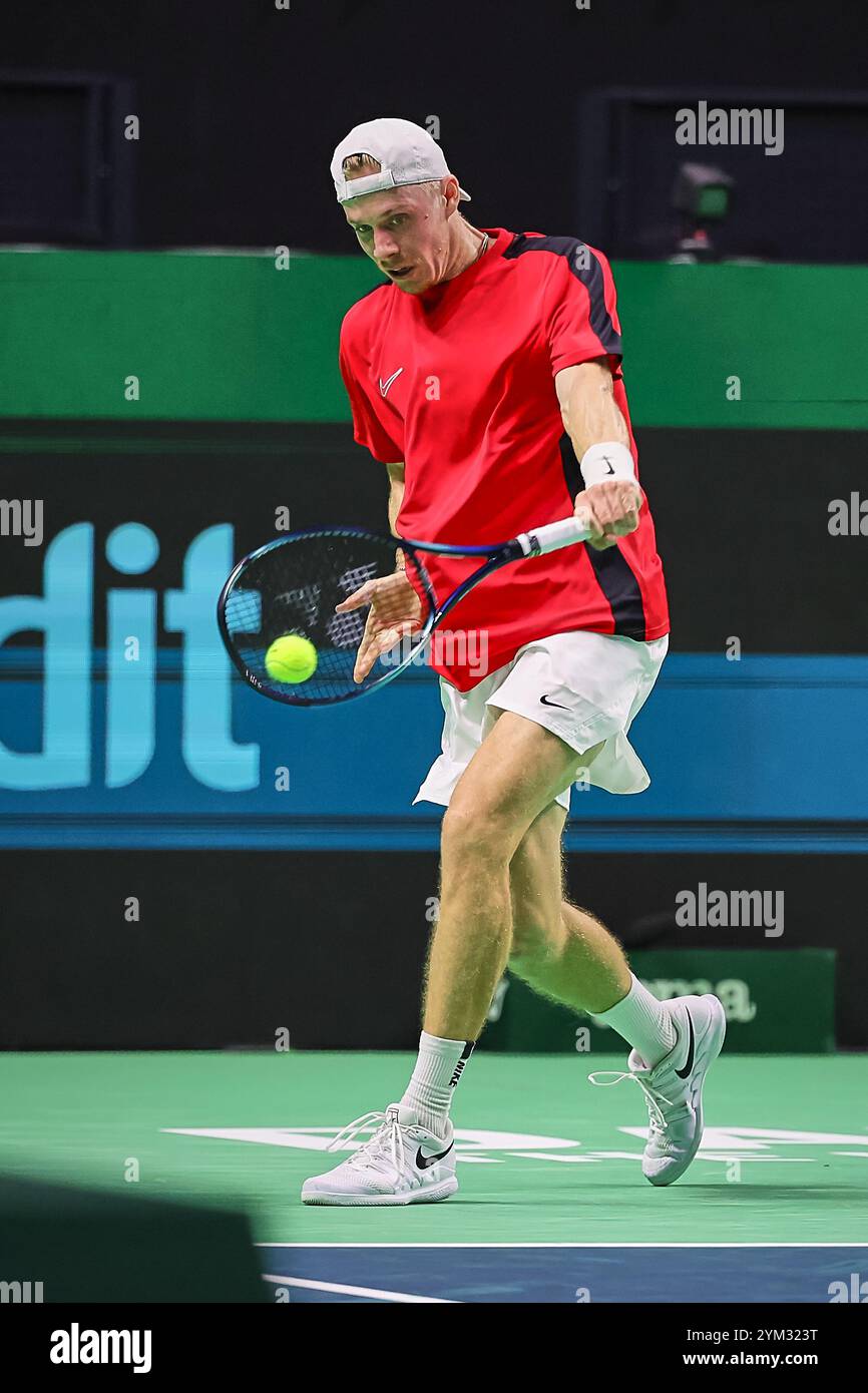Malaga, Malaga, Spain. 20th Nov, 2024. Denis Shapovalov of Canada, returns with backhand in his ...