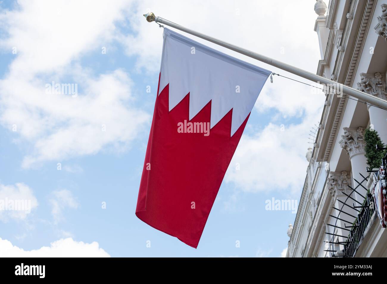 Red white National flag of Bahrain, Kingdom of Bahrain, island country ...