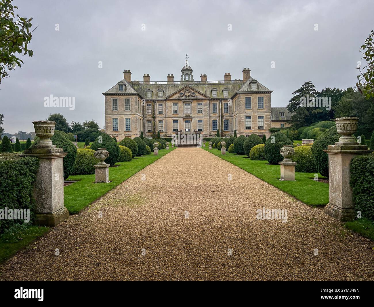 Formal garden with path leading to an English stately home Stock Photo ...