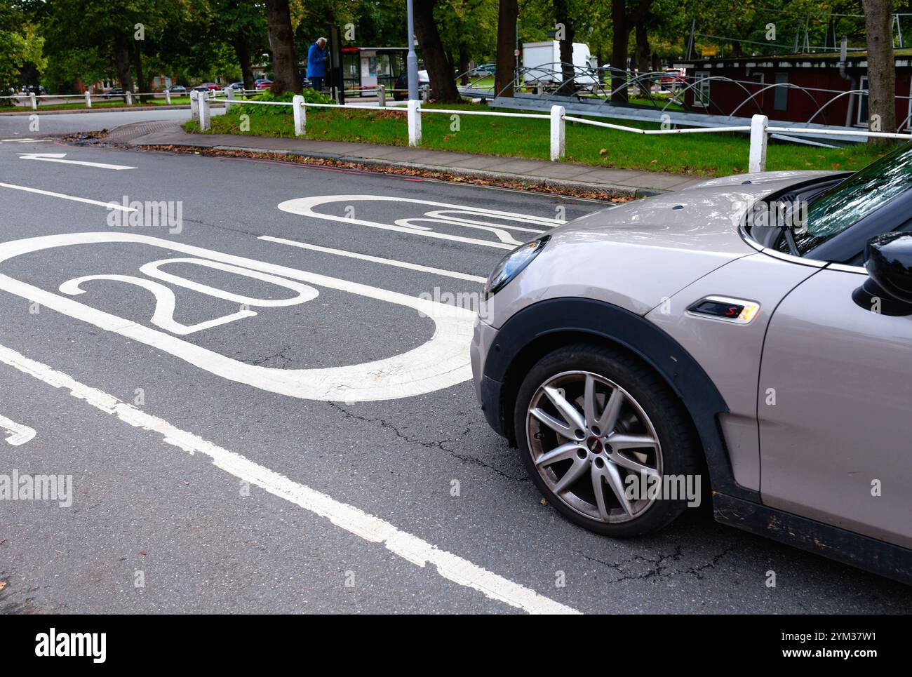 Large painted '20 MPH' signs on a public roadway At Kew Green Greater ...