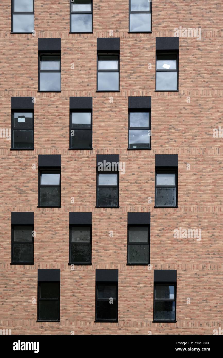 Apartment building with stone as a decorative facade in Praga district ...
