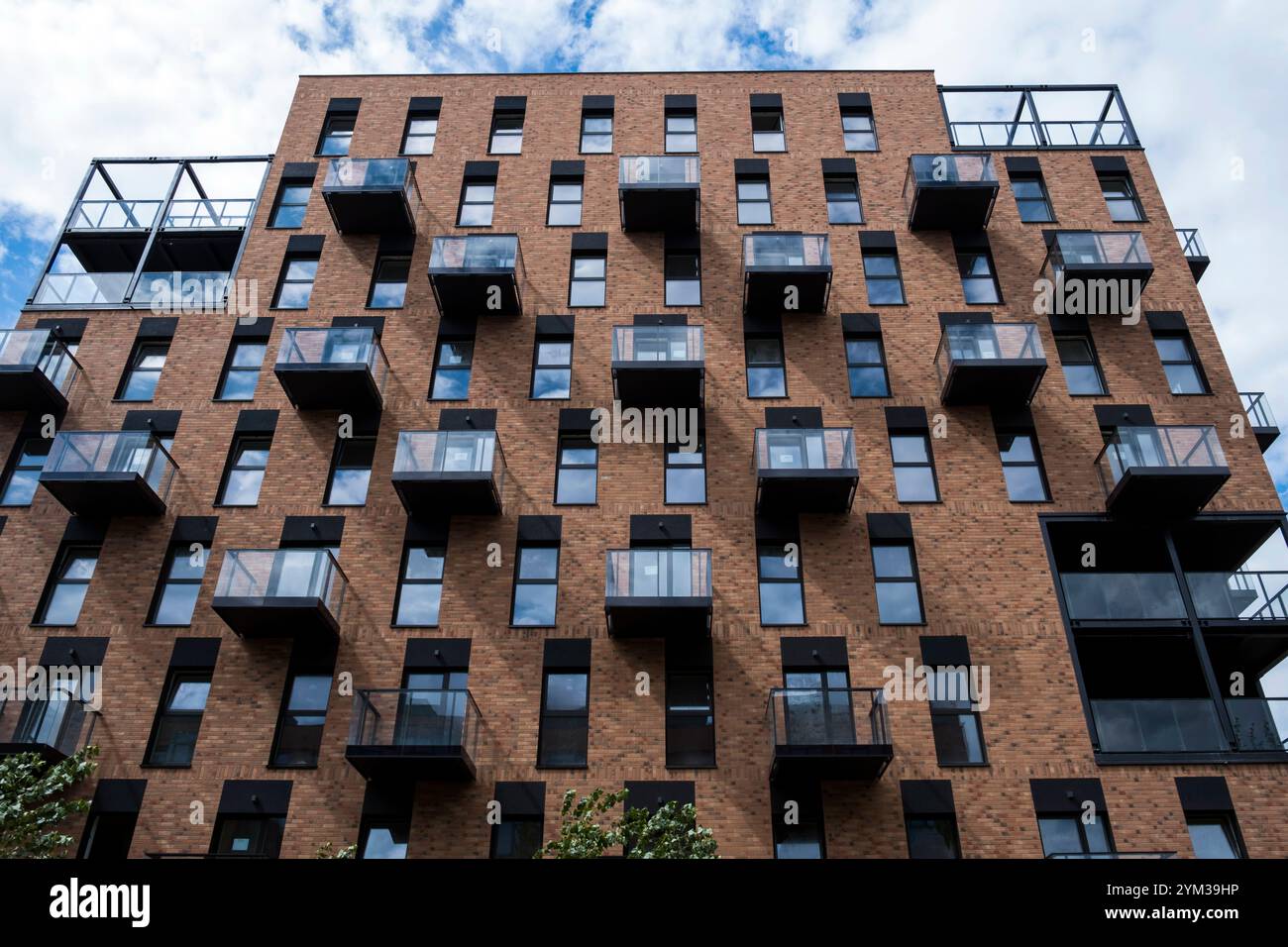 Apartment building with stone as a decorative facade in Praga district ...