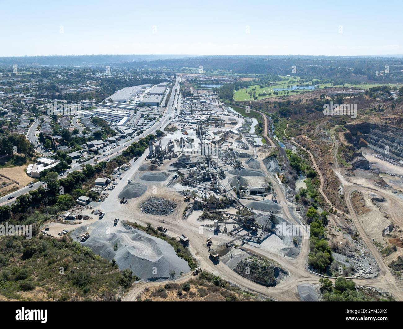 Aerial view of industrial sand and gravel quarry open-pit mining site ...