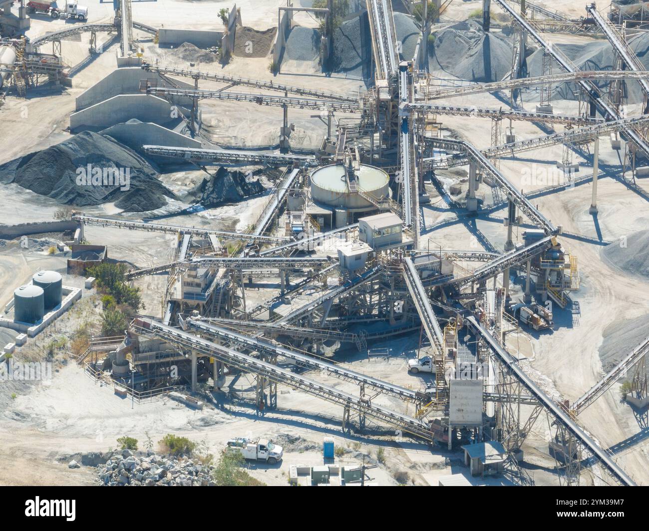 Aerial view of industrial sand and gravel quarry open-pit mining site ...