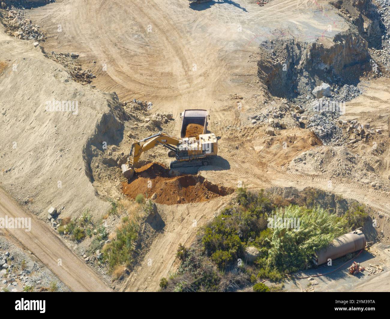 Aerial view of industrial sand and gravel quarry open-pit mining site ...