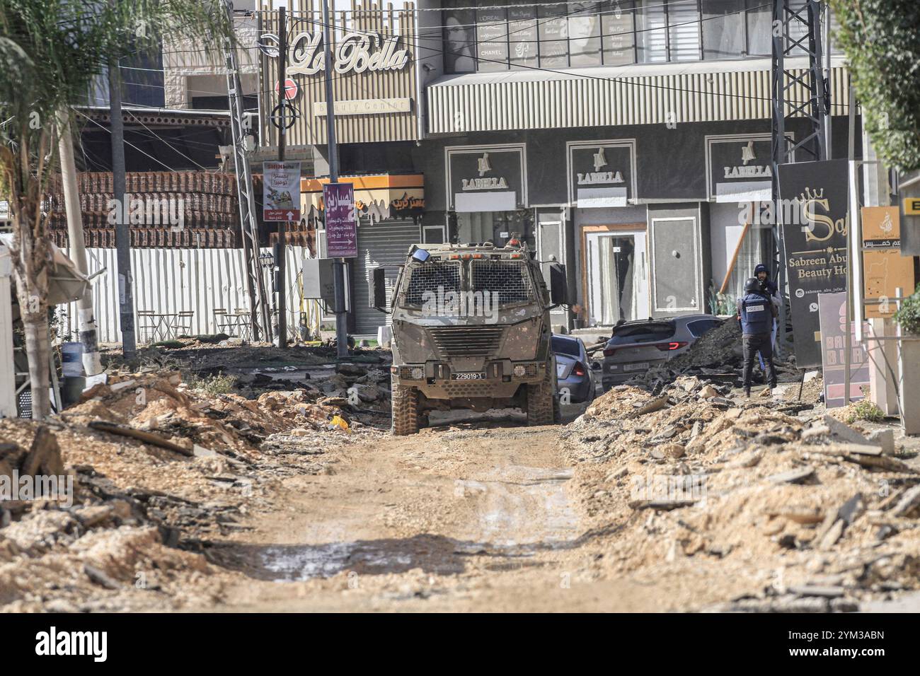 Jenin, Palestine. 20th Nov, 2024. Israeli military vehicles roam the ...