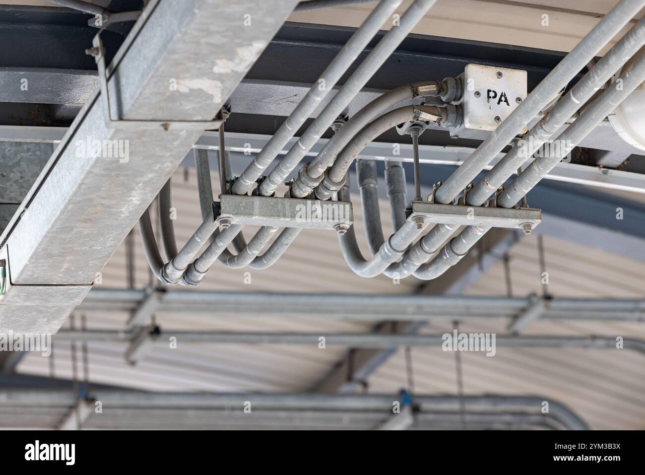 Steel Tube Fitting, Electricity wire tubes on a concrete wall and ...